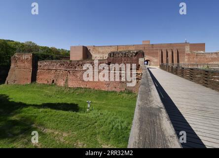 Novara Castle. Wooden bridge and brick castle walls. Novara Castle ...