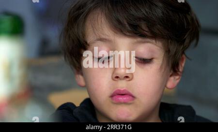 Youngster's Distanced Gaze and Evident Boredom, Rolling Eyes. bored kid ...