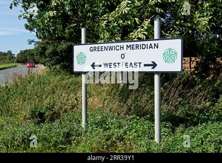 Sign for the Greenwich Meridian, just outside the village of Patrington ...