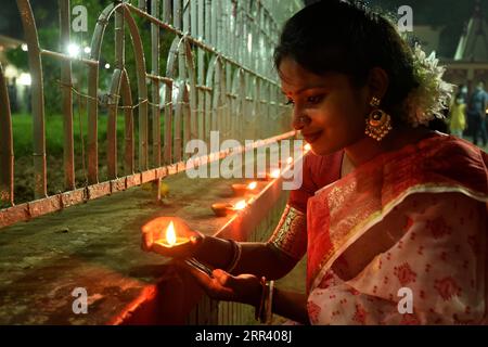 201115 -- DHAKA, Nov. 15, 2020 -- People play with firecrackers to celebrate Diwali, the Hindu ...