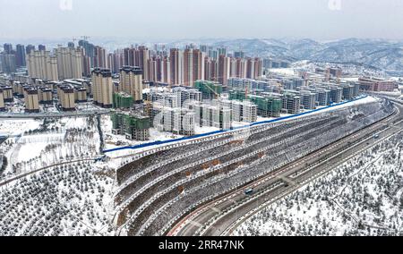 Aerial photo shows the snow-covered terraced fields in Dingxi City ...