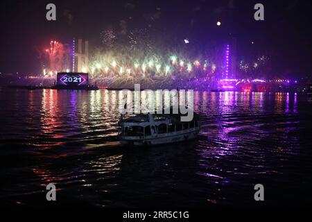 210101 -- CAIRO, Jan. 1, 2021 -- Tahya Misr Bridge is lit up during New ...