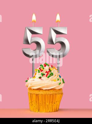 Birthday card number 55 - Cupcake with balloons Stock Photo - Alamy