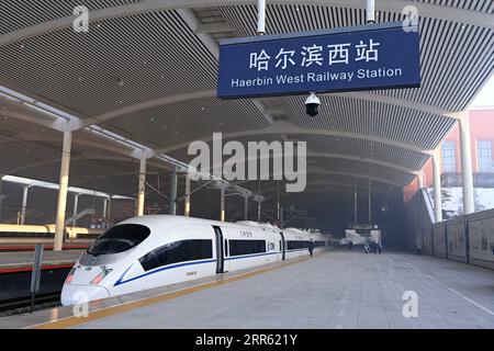 Passengers are seen at Harbin railway station in Harbin City, northeast ...