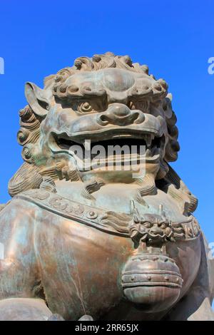 copper lions in a temple, closeup of photo Stock Photo - Alamy
