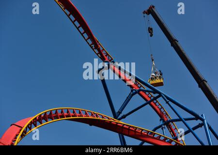 Roller coaster inspection Stock Photo - Alamy