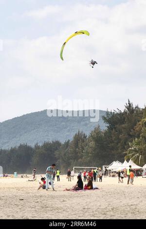 210221 -- WANNING, Feb. 21, 2021 -- People spend time on the beach in ...
