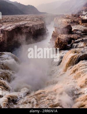 210223 -- YAN AN, Feb. 23, 2021 -- Aerial photo taken on Feb. 23, 2021 ...