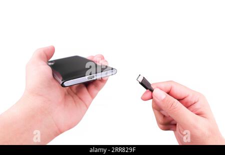 insert USB type c plug into USB port on laptop computer Stock Photo - Alamy