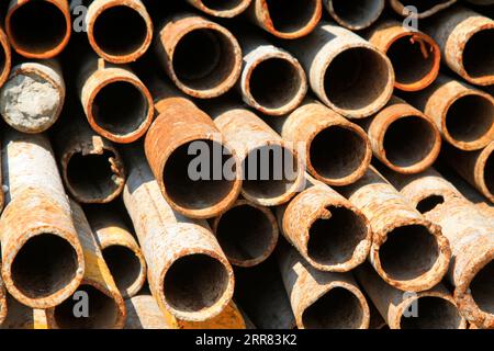 Rust deformation steel pipe in the construction site Stock Photo - Alamy