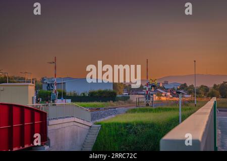New traffic circle and bridge for railway with sunset summer colors ...