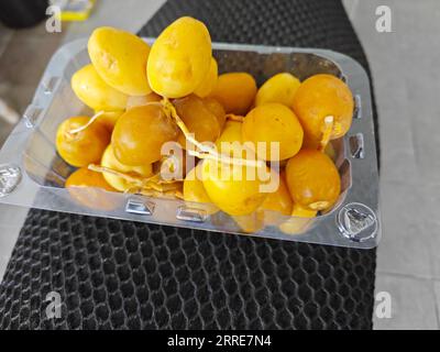 cluster of fresh ripe yellow date Stock Photo - Alamy