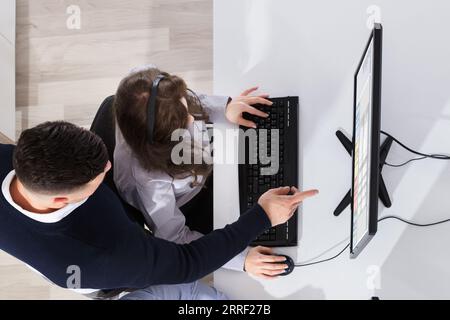 Man agent operator with headset giving support. At a modern office ...