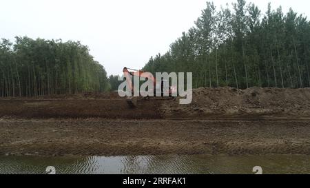 Excavator in construction of water conservancy project, North China ...