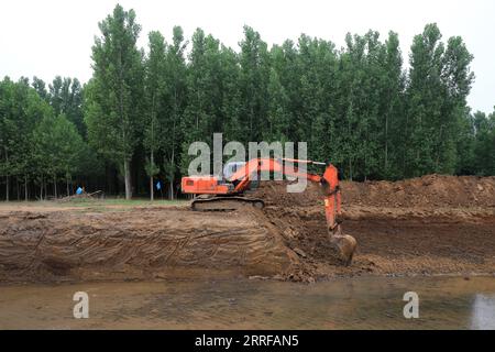 Excavator in construction of water conservancy project, North China ...