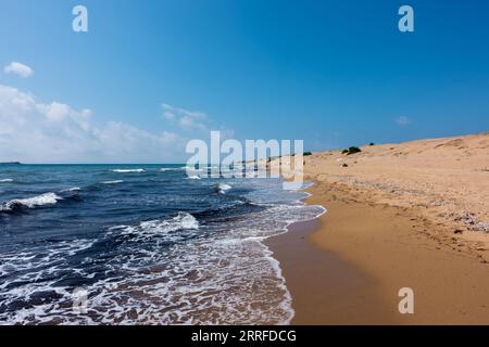 The gorgeous sandy beach of Issos in Corfu island, Greece Stock Photo ...