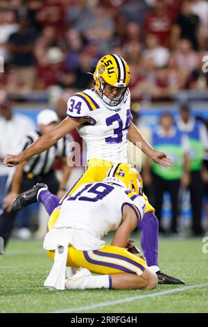 LSU Tigers place kicker Damian Ramos (34) connects on an extra point ...