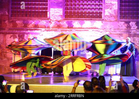 220424 -- CAIRO, April 24, 2022 -- Dancers perform Tanoura, a ...