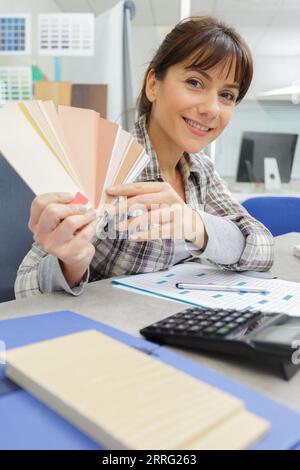 woman picking a color for her house walls Stock Photo - Alamy