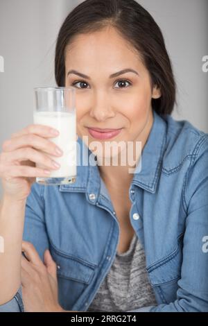 Beautiful middle age mature rich woman wearing leopard dress over ...