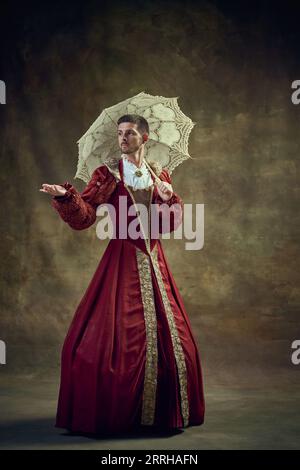 Gender norms. Medieval prince, nobleman wearing female dress and ...