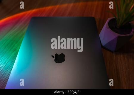 Laptop back with colorful lights - Apple Macbook pro computer Stock ...