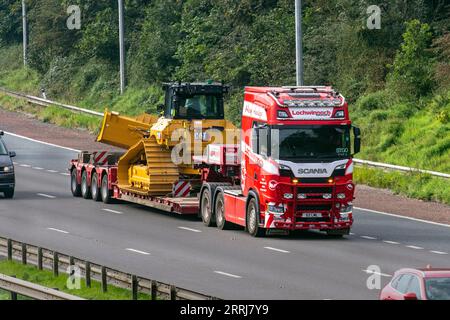 Scania semi trailer oversize load transport of a 5,5 m high steel frame ...