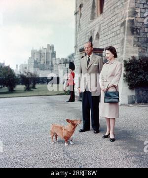 Queen Elizabeth II is joined by one of her dogs, a Dorgi called Candy ...