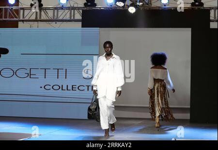 220828 -- ADDIS ABABA, Aug. 28, 2022 -- A model presents a creation ...