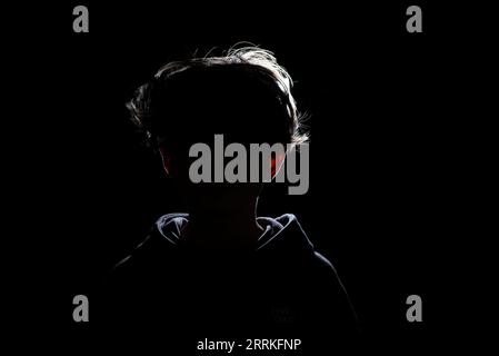 Shadow outline of a boy Stock Photo - Alamy