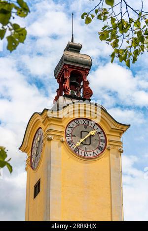 baroque gate building with clock tower as entrance portal to the New ...