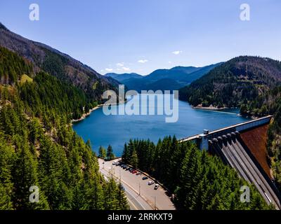 An aerial view of a Detroit Dam surrounded by lush green in Detroit on ...