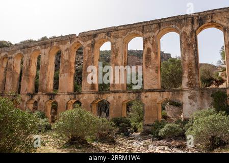 Ancient Haroune aqueduct near the archeological Roman city of Volubilis ...