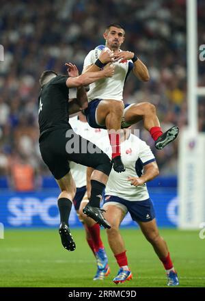 New Zealand's Will Jordan (left) and Scotland's Rory Darge in action ...