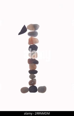 Number 1 handcrafted using small stones or pebbles, single object ...