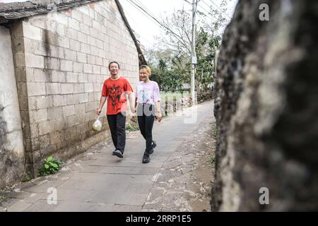 (230210) -- HAIKOU, Feb. 10, 2023 (Xinhua) -- Cartoonist Liu Ke poses ...