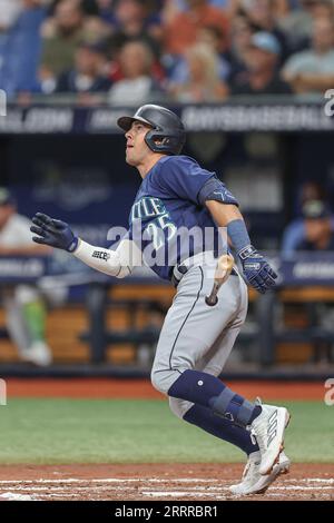 Seattle Mariners' Dominic Canzone scores on an RBI double from J.P ...