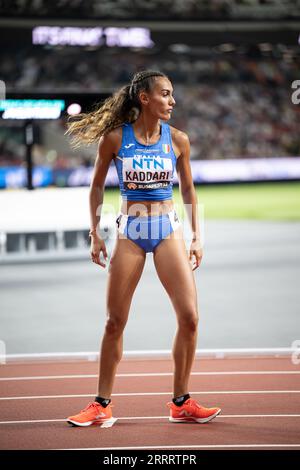 Dalia Kaddari participating in the 4X100 meters relay at the World ...
