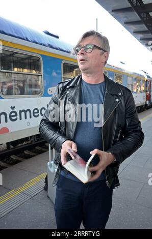 Train stands by the platform before departure. China Stock Photo - Alamy