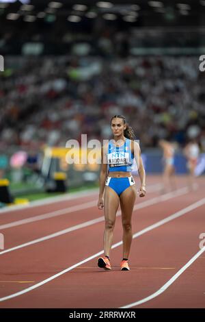 Dalia Kaddari participating in the 4X100 meters relay at the World ...