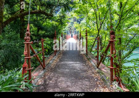 Wagatani Suspension Bridge, across Daishoji River. Yamanakaonsen ...