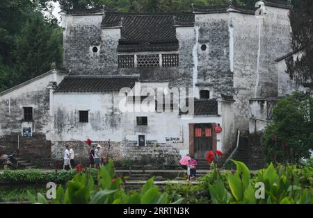 230802 -- JINHUA, Aug. 2, 2023 -- Tourists visit the Zhuge Village of ...