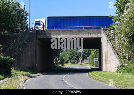 motorway bridge carrying the m1 over a local road Stock Photo - Alamy