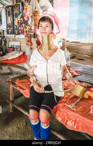 Chiang Mai, Thailand. 1st Sep, 2023. A Karen woman is seen weaving at ...