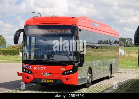 Black and red bus runned by RET in R-NET colors in the Netherlands ...