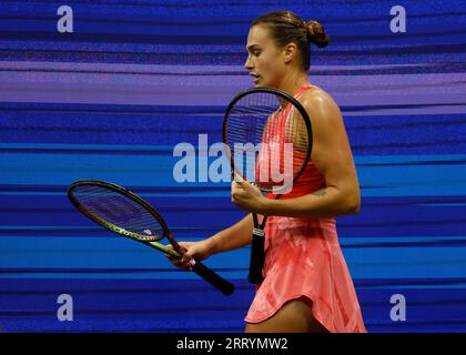 Aryna Sabalenka of Belarus changes rackets during her semifinal match ...