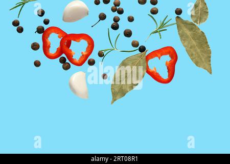 Many different spices flying on white background Stock Photo - Alamy