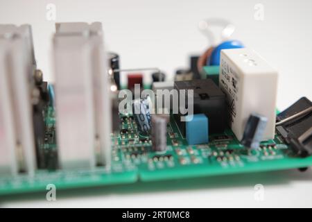 Power Supply modern printed-circuit board with electronic components ...