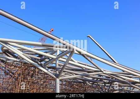giant steel tube and the scaffold under the blue sky Stock Photo - Alamy