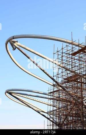 Arc steel tube landscape architecture in a construction site Stock ...